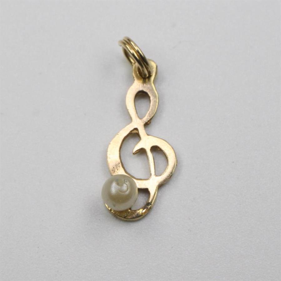 14k Gold Treble Clef Pendant | Property Room