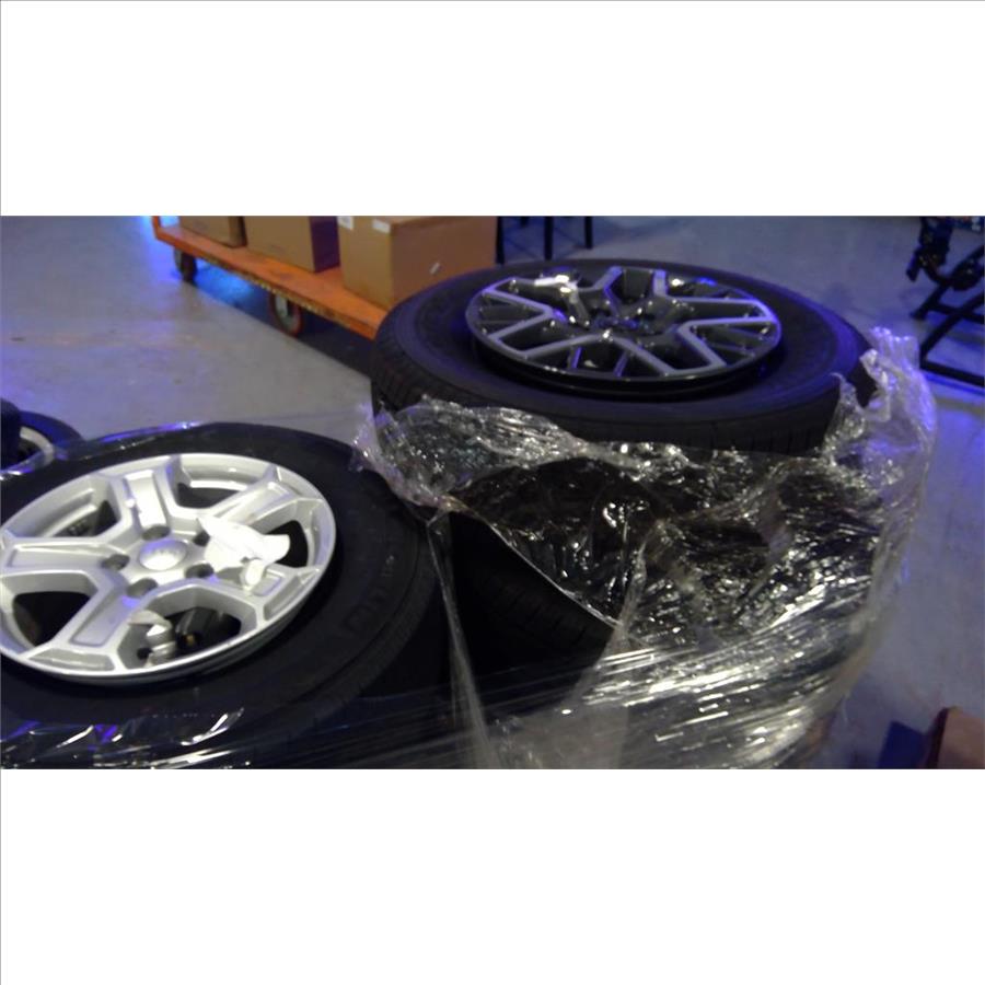 Pallet With Rims And Tires, 7 Pieces | Property Room