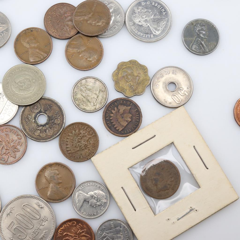 1+ Lbs US & Foreign Coins | Property Room