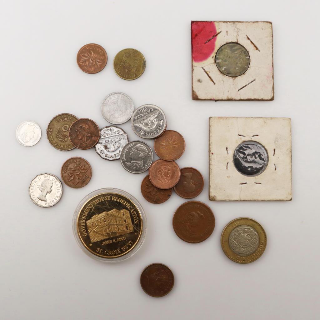10+ US And Foreign Coins, Includes 1 Silver Coin | Property Room
