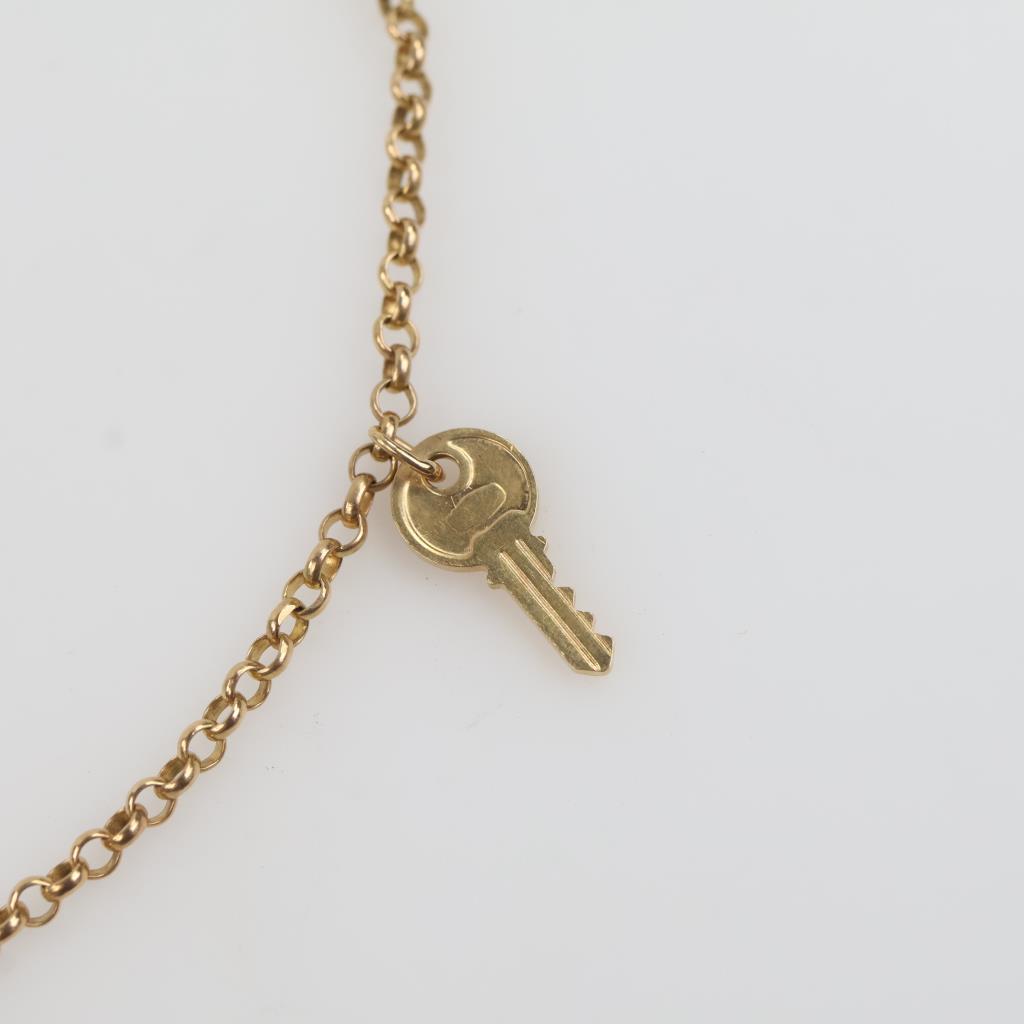 10kt Gold Heart And Key Charm Bracelet | Property Room