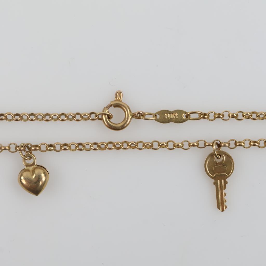 10kt Gold Heart And Key Charm Bracelet | Property Room