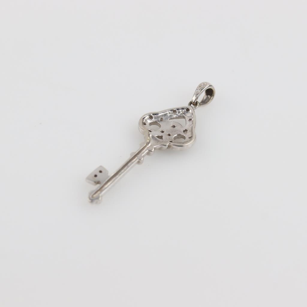 10kt White Gold Clear Stone Key Pendant | Property Room
