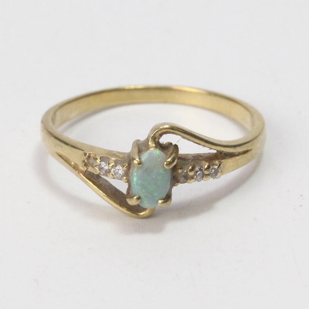 13k Gold 1.97g Ring With Diamonds And Iridescent Stone | Property Room
