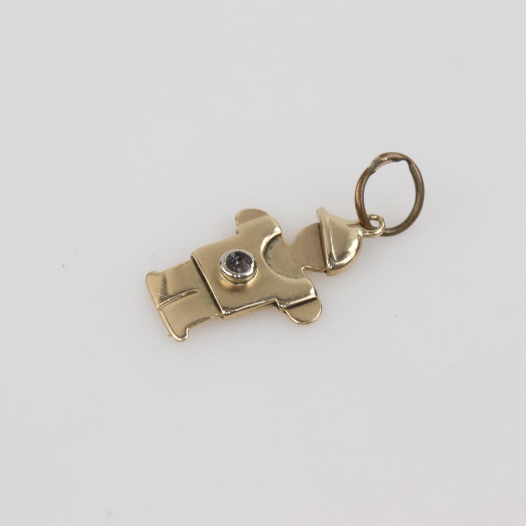 14kt Gold Black Stone Child Motif Pendant | Property Room