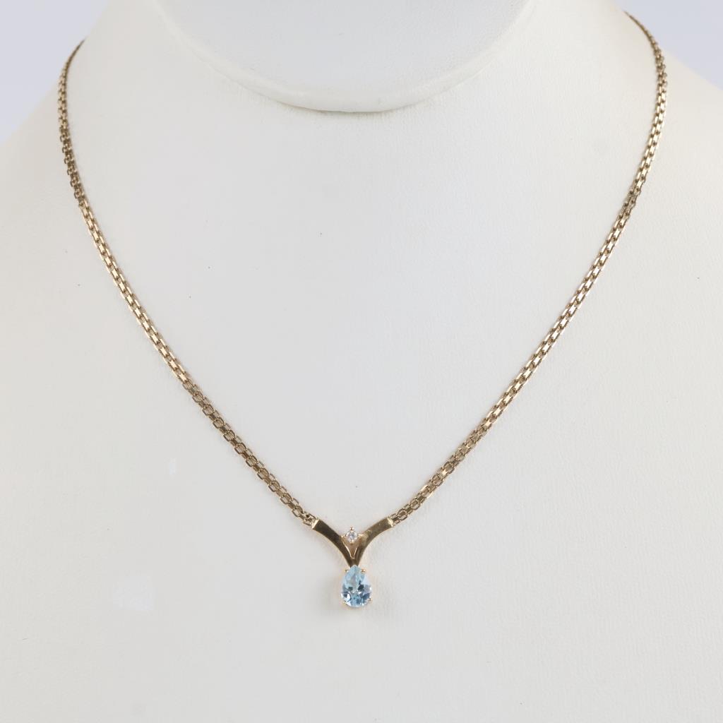 14kt Gold Clear Stone And Blue Stone Panther Chain Necklace | Property Room