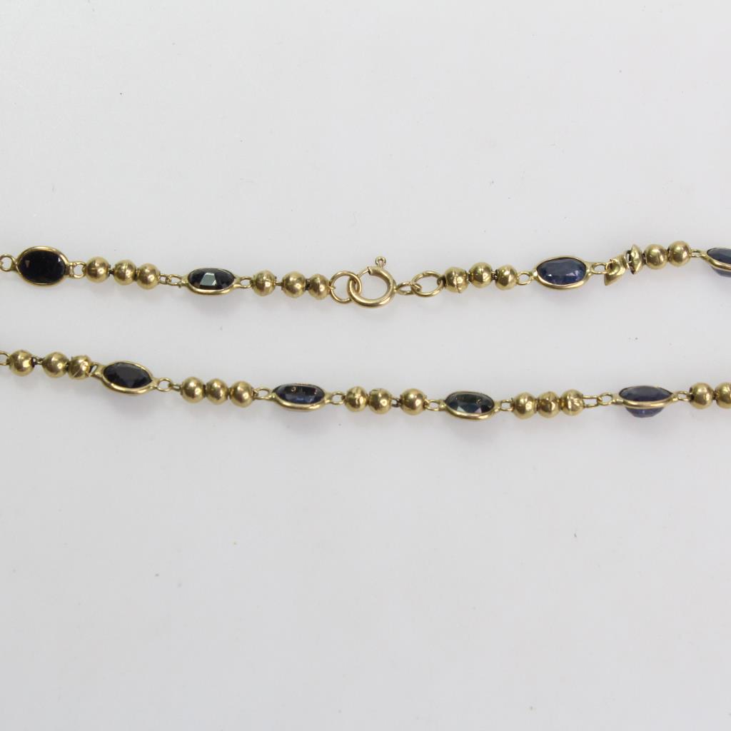 17k Gold 3.10g Bracelet With Dark Blue Stones | Property Room