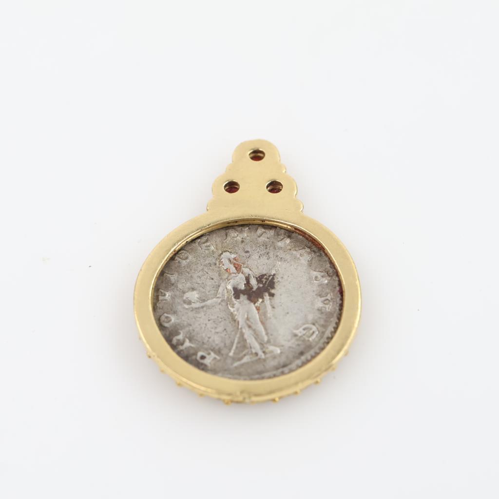 18kt Gold Ruby Coin Holder With Ancient Silver Coin | Property Room