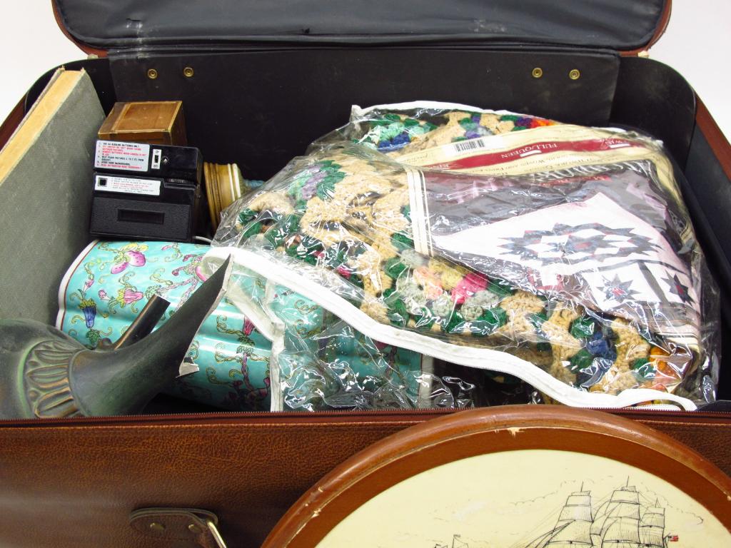 Compass Suitcase With Assorted Items | Property Room