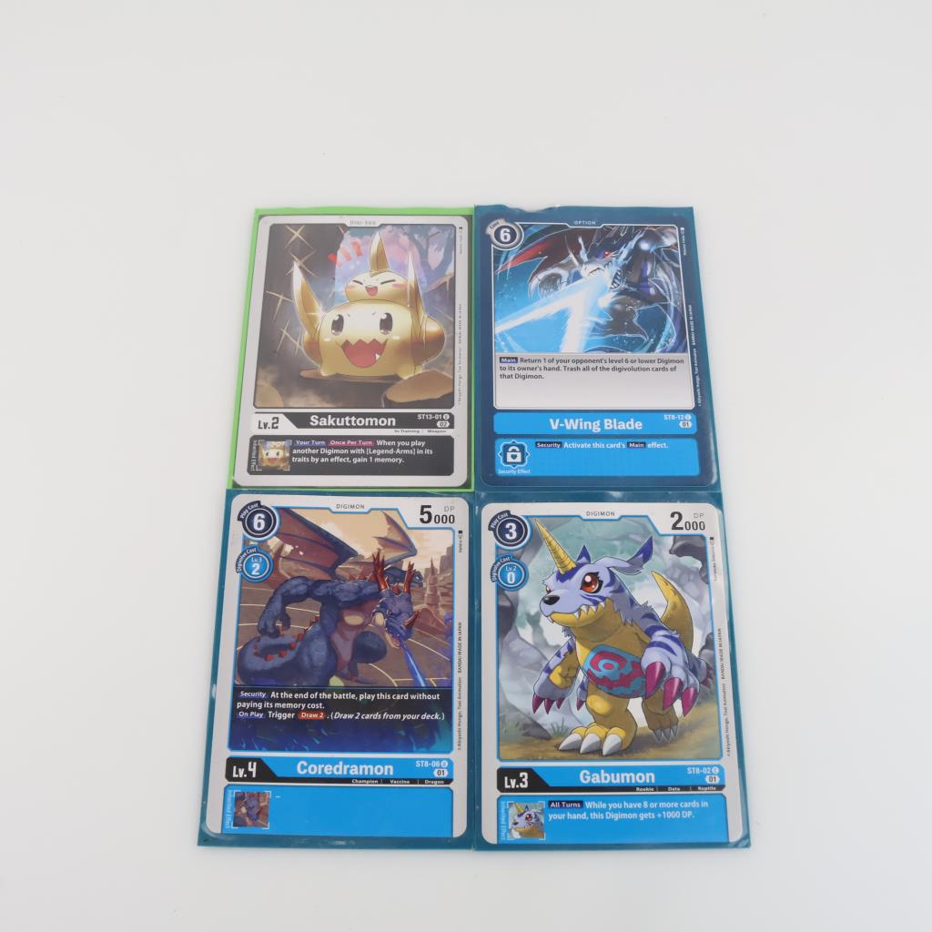 4 Digimon Trading Cards | Property Room