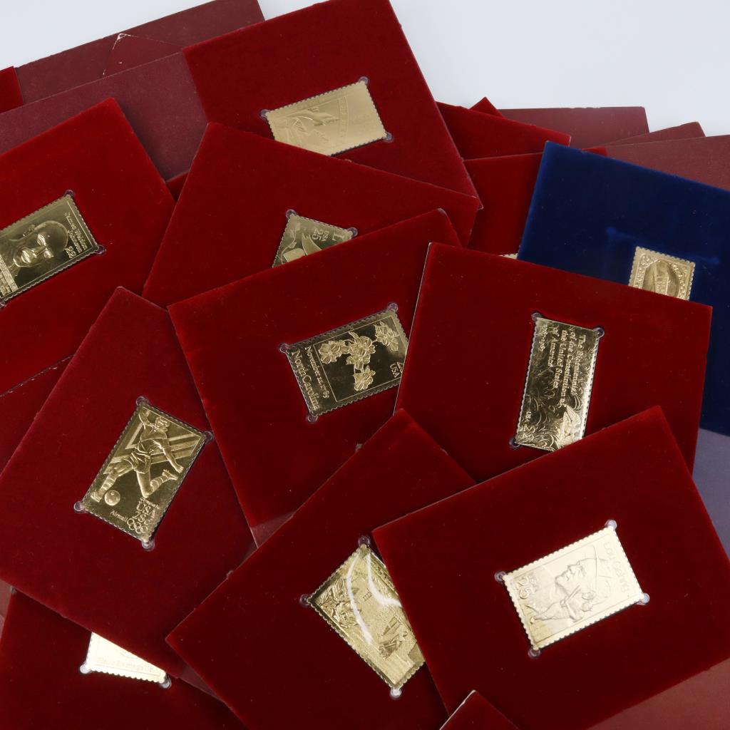 50+ Gold Replica Of The US First Day Of Issue Stamps | Property Room