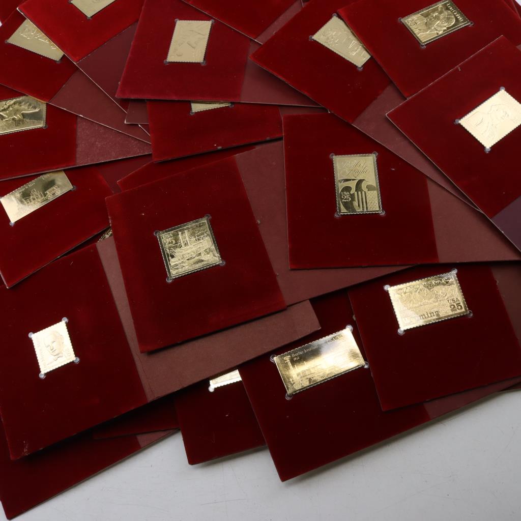 50+ Gold Replica Of The US First Day Of Issue Stamps | Property Room