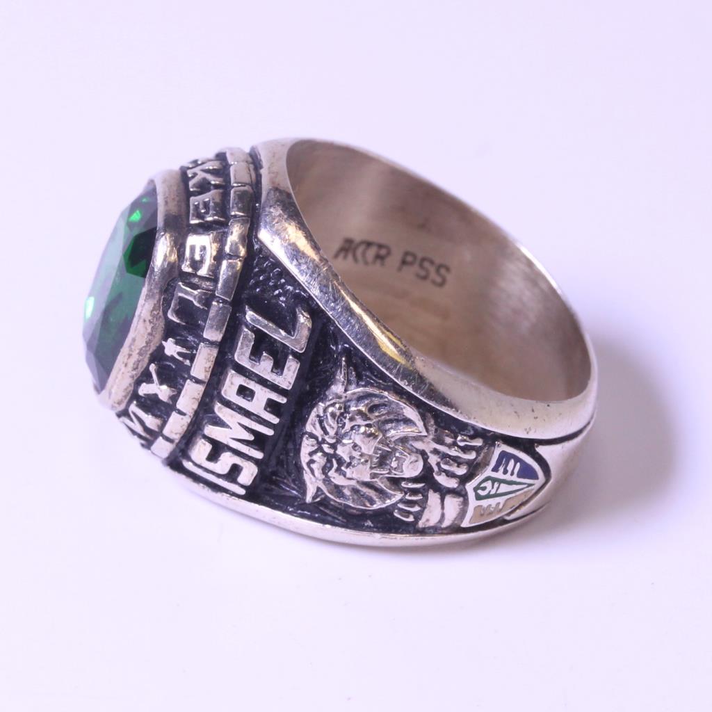 83% Silver 13.9g 2013 Class Ring With Green Stone | Property Room