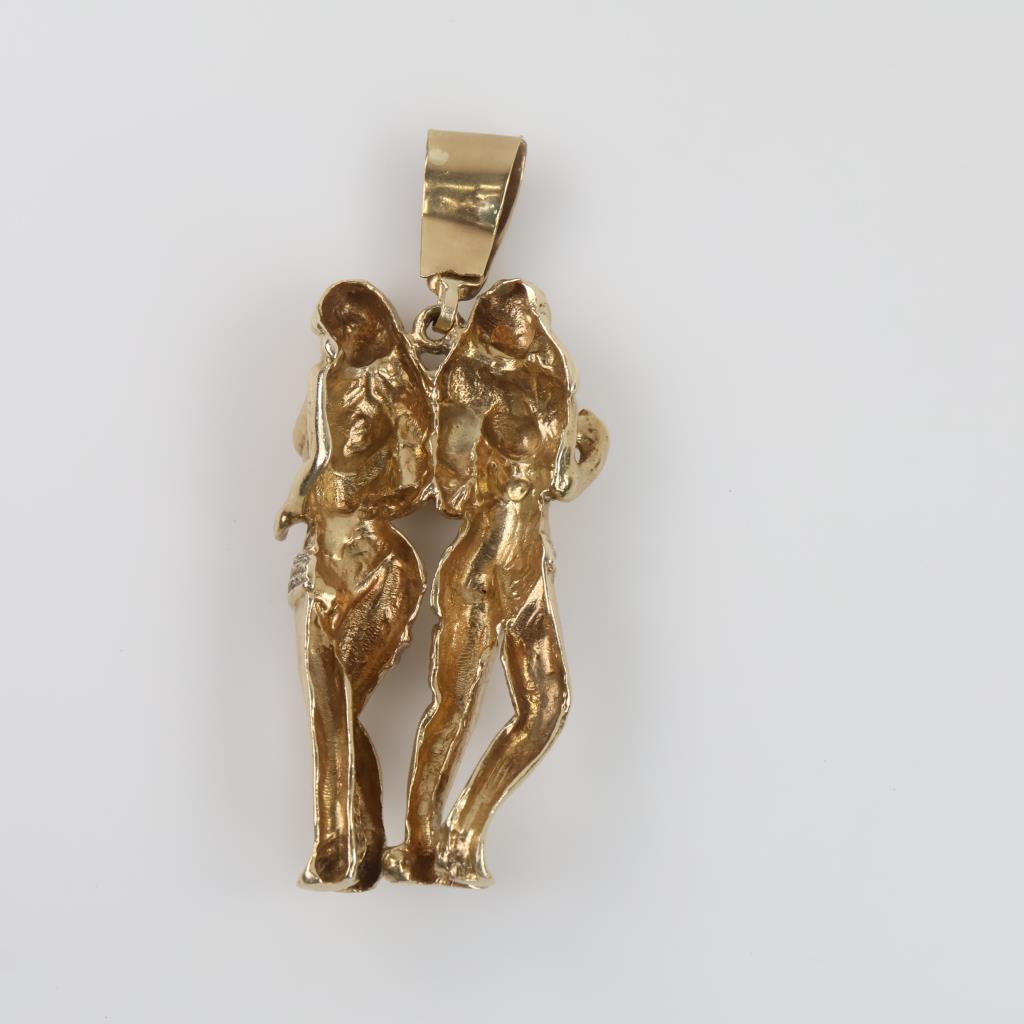 8kt Gold Figurine Pendant | Property Room