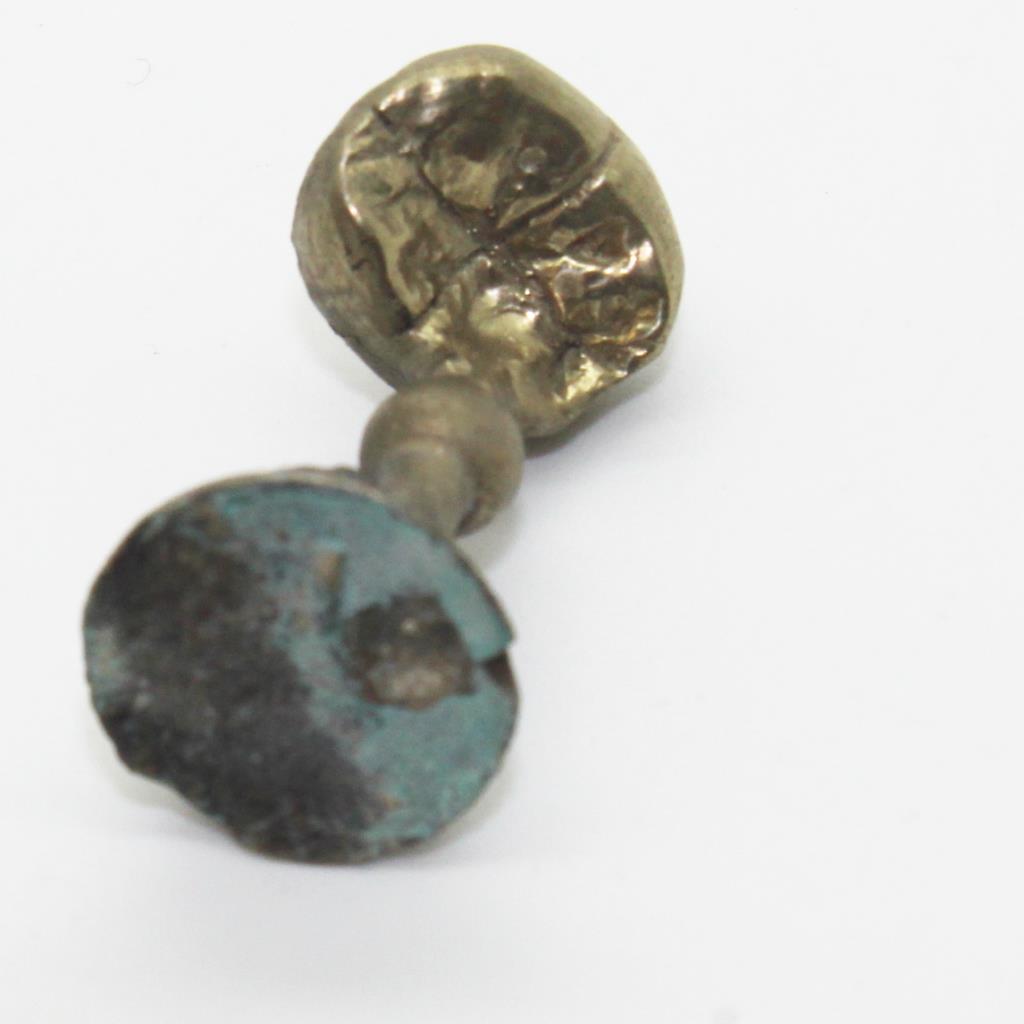 9.0g 11kt Gold Teeth Molds | Property Room