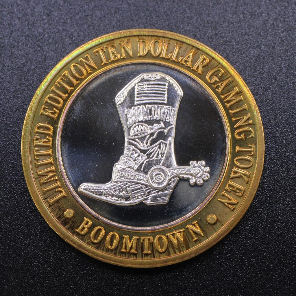 .999 Silver And Brass Boomtown Gaming Token | Property Room