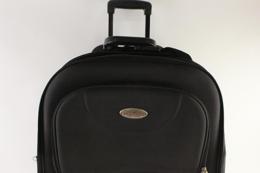 Air Express Standing Rolling Suitcase | Property Room