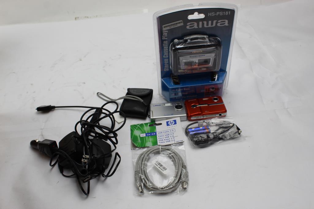 Aiwa Cassette, Polaroid, Largan Camera, + More 7 Pieces | Property Room