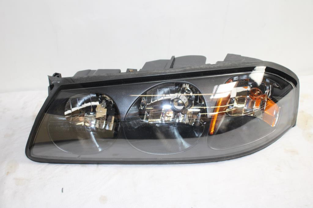 Automotive Parts RH Headlight 10449748 Headlamp | Property Room