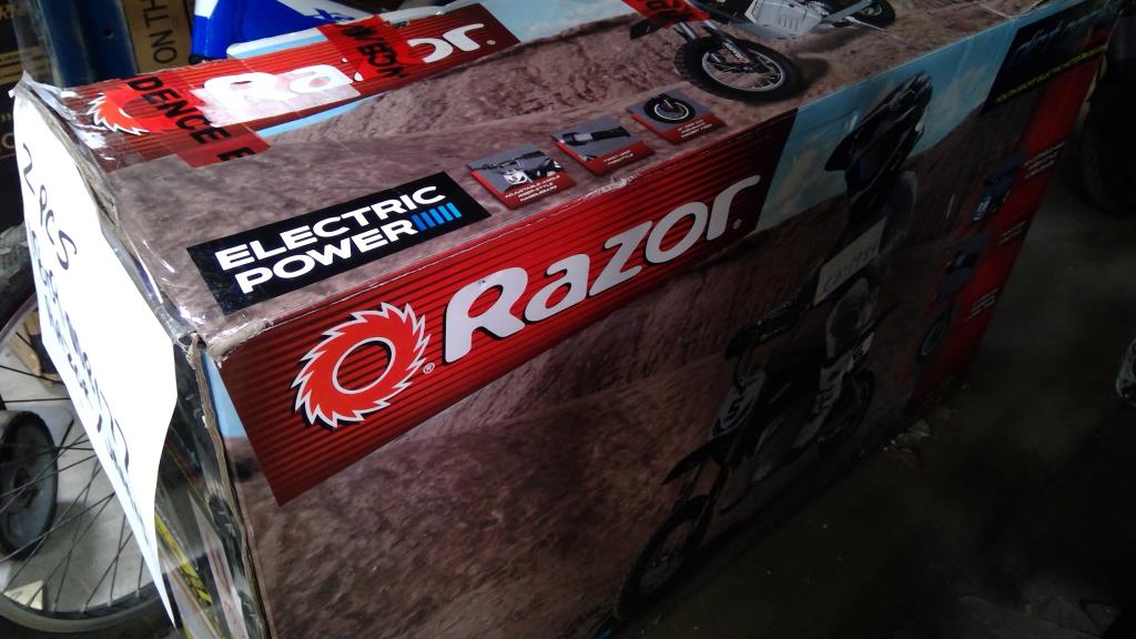 Brand New Razor Electric Dirt Bike And Jamis Kids Bicycle | Property Room