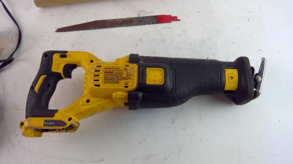 Bridgestone Bag With Unbranded Air Compressor And Triangles | Property Room