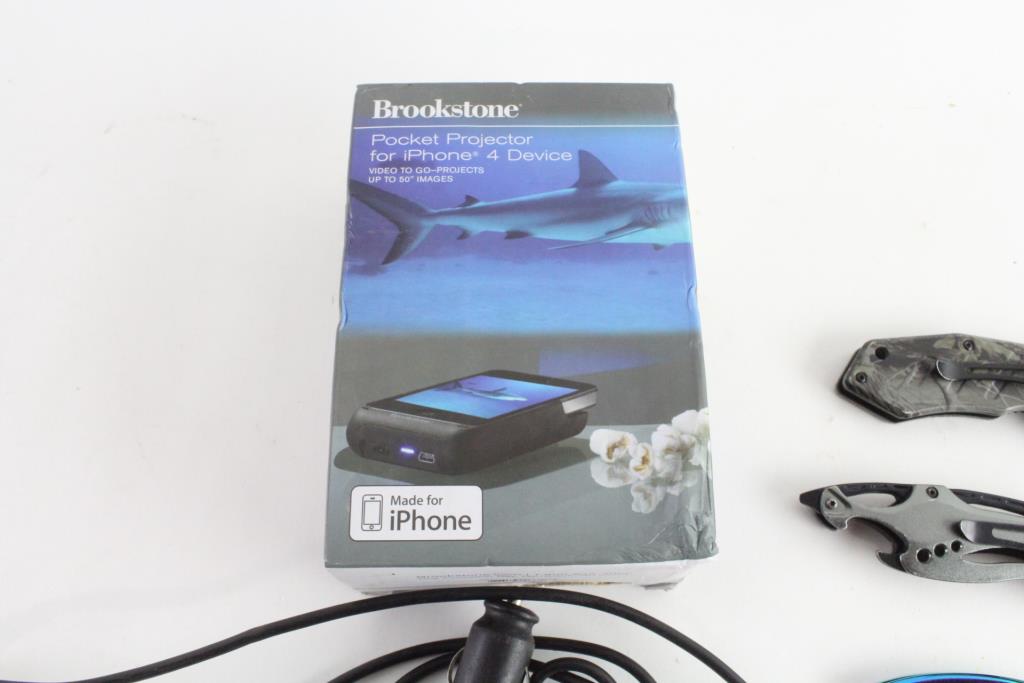 Brookstone Pocket Projector And More, 6 Pieces | Property Room