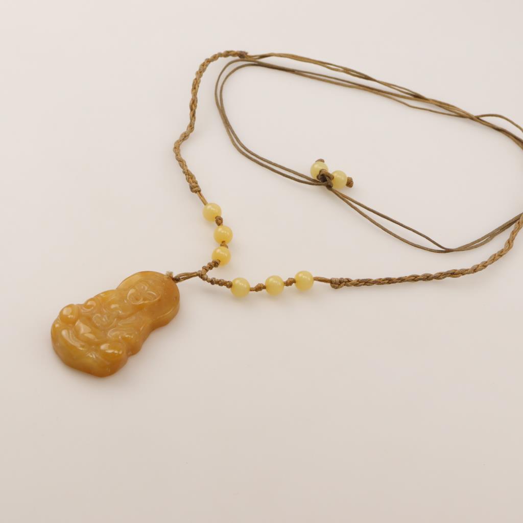 Brown Jadeite Budda Pendant With Cord | Property Room