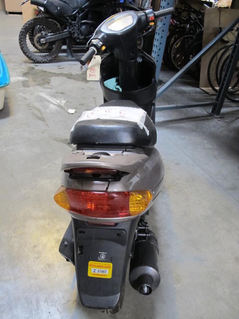 Brown Motor Scooter Moped | Property Room