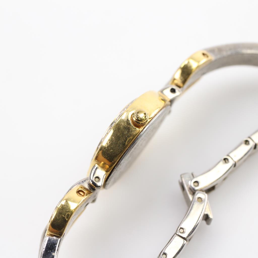 Bulova Gold Tone Circle Design Bangle Watch | Property Room