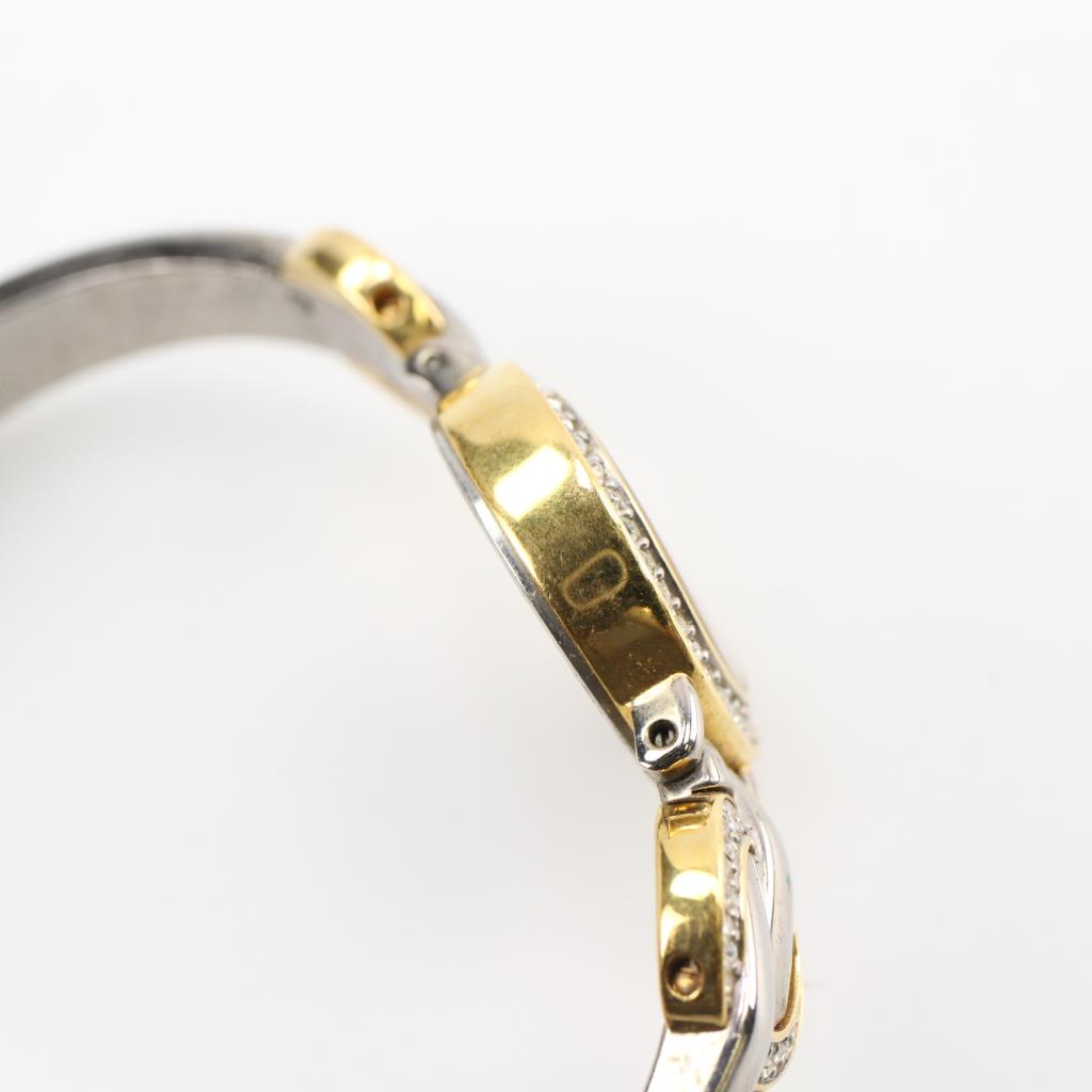 Bulova Gold Tone Circle Design Bangle Watch | Property Room