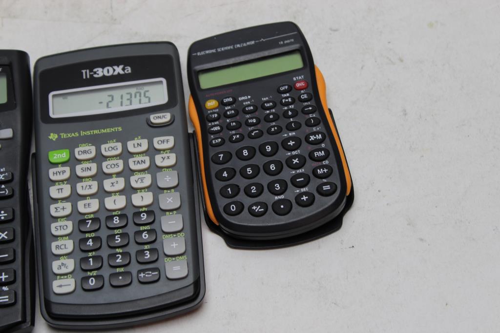 Caliber, Casio, Texas Instruments Calculators 4 Pieces | Property Room