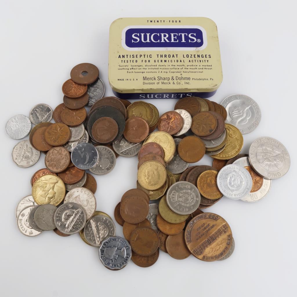 Collectible Tin with Foreign Currency And Tokens, 1+lb | Property Room