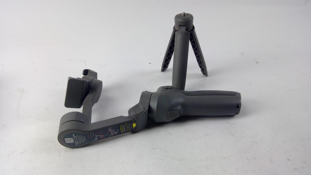 DJI Osmo Mobile SE Intelligent Gimbal Phone Tripod | Property Room DJI Osmo Mobile SE Intelligent Gimbal Phone Tripod | Property Room