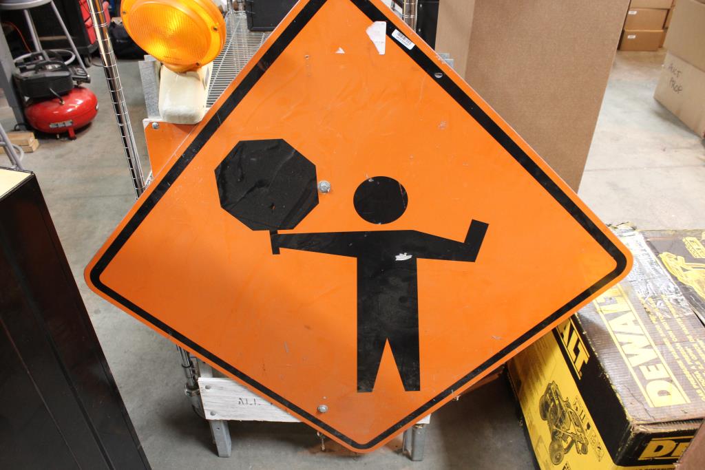Flag Man Ahead Road Sign | Property Room