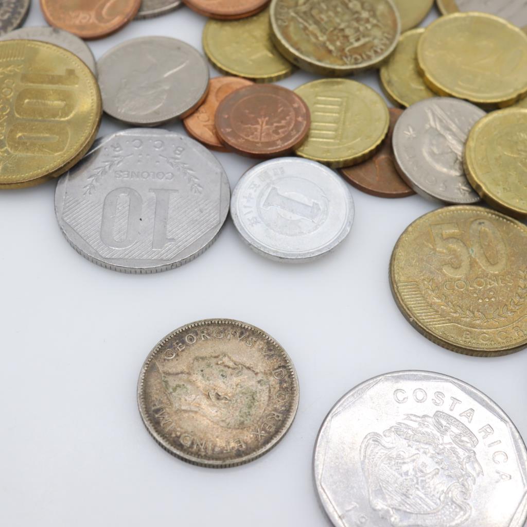 Foreign Currency, 1+ Lbs Includes Silver Coin | Property Room