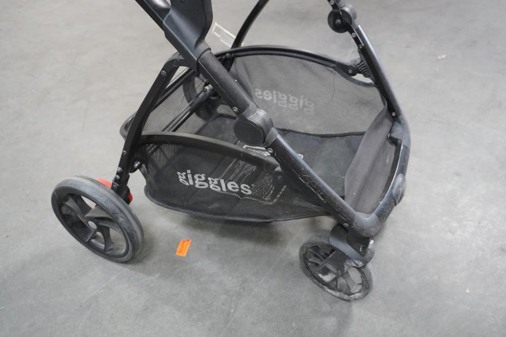Giggles Black Rolling Push Stroller | Property Room