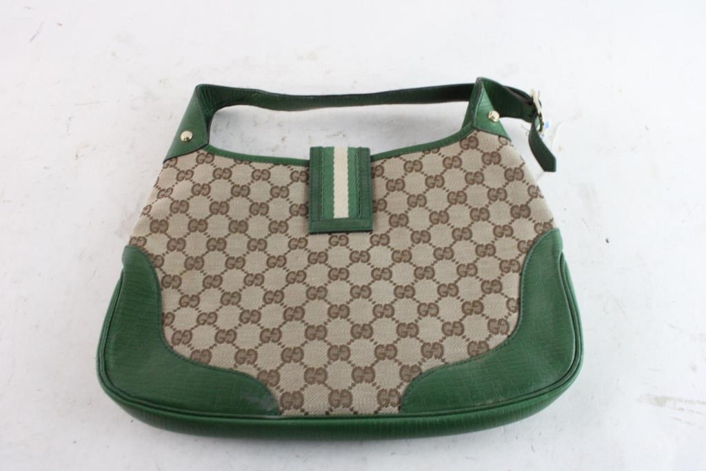 Gucci GG Canvas Locking Purse - Doublechecked By Entrupy | Property Room
