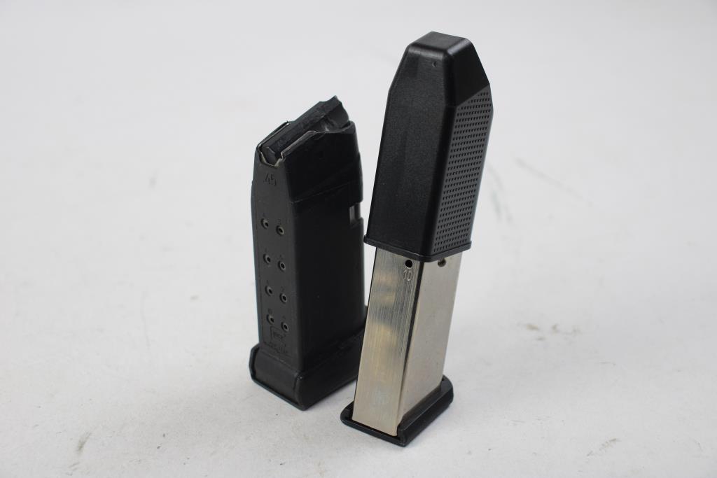 Handgun Magazines (2) Silver In Color With Black Bottom | Property Room