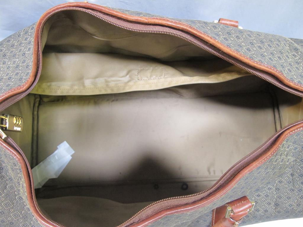 Hartmann Duffle Bag, ProTek Tempered Glass: 10+ Pieces | Property Room