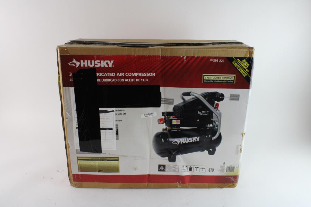 Husky Rolling Air Compressor | Property Room