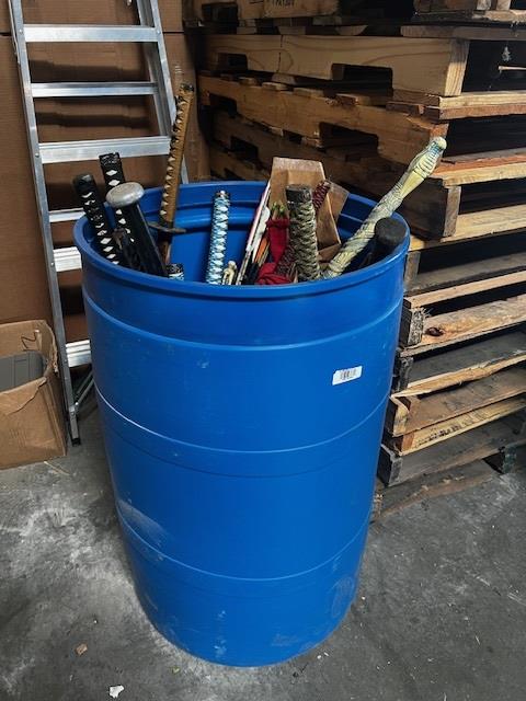 Large Drum With Swords, Machetes, And Misc Metal | Property Room