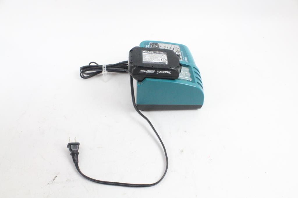Makita Battery And Charger, 2 Pieces | Property Room