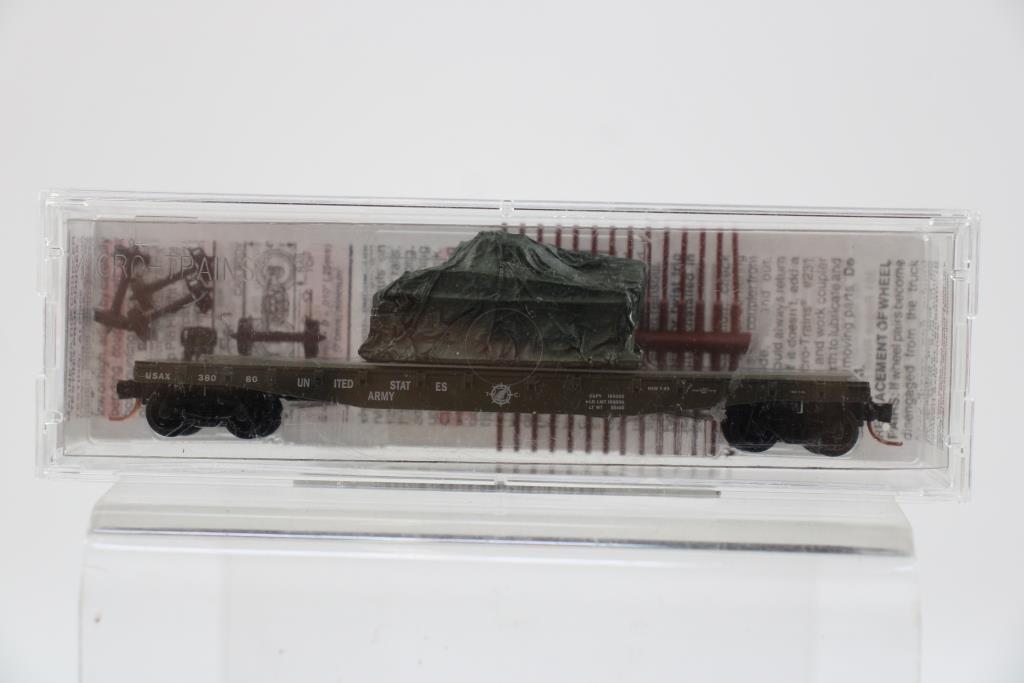 Micro-Trains Line 50' Flat Car Fishbelly Side With Tank Load U.S Army | Property Room