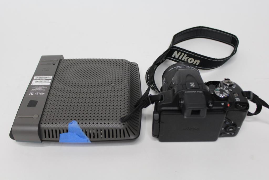 Nikon Camera, Cisco Router And More. 4 Items | Property Room
