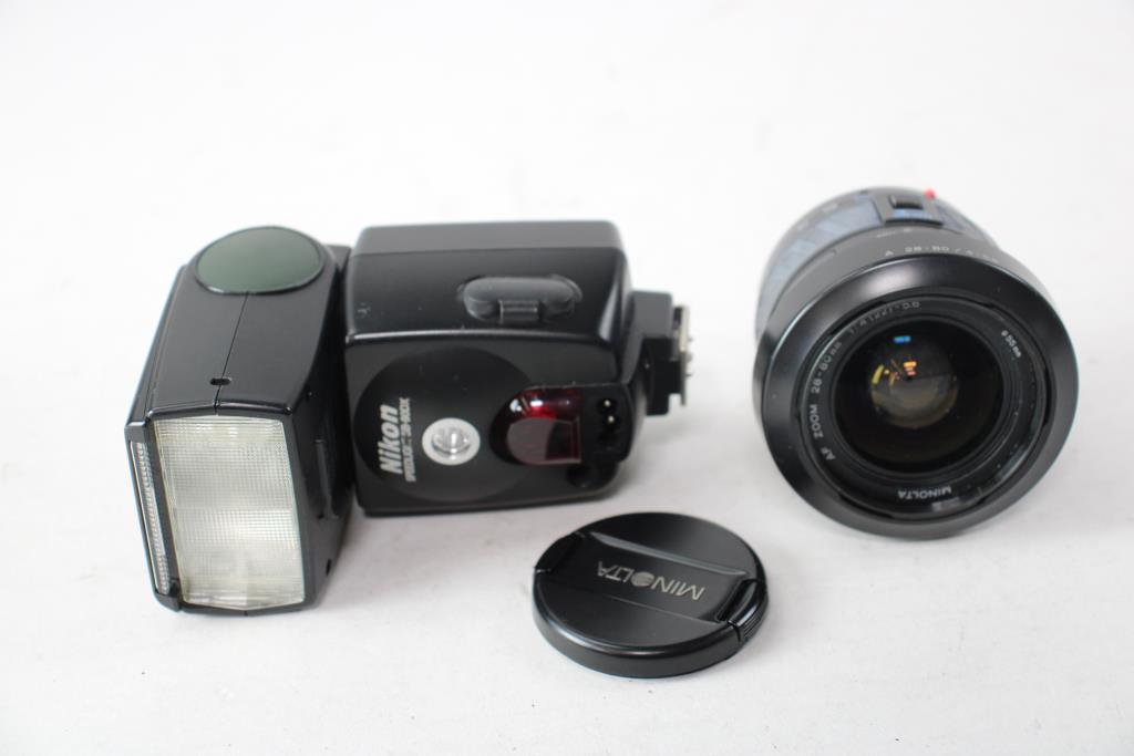 Nikon Flash Attachment And Camera Lens, 2 Pieces | Property Room
