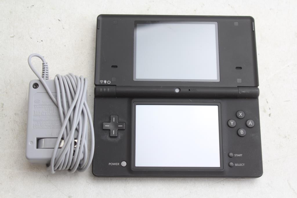 Nintendo DSi Portable Gaming System, Game And Charger | Property Room