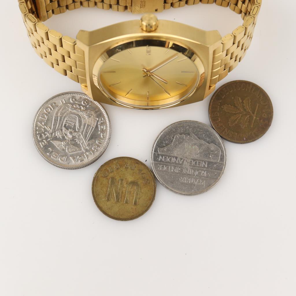 Nixon Time Teller Watch And Foreign Coins | Property Room
