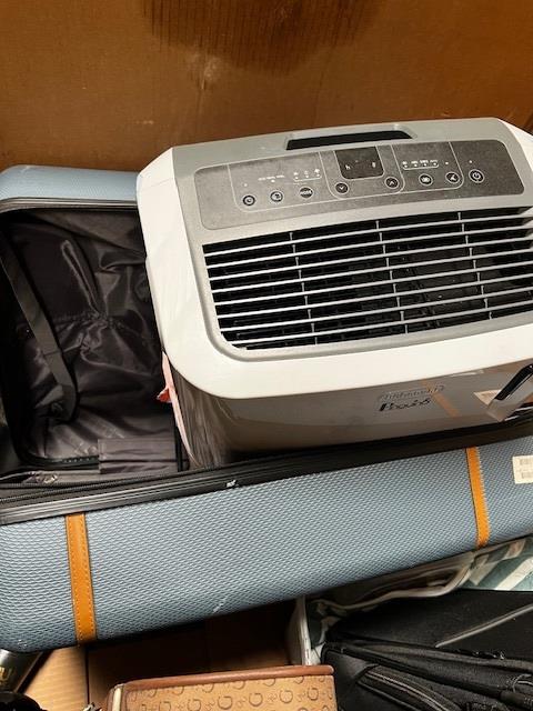 Pallet Of Suitcases And Portable AC | Property Room