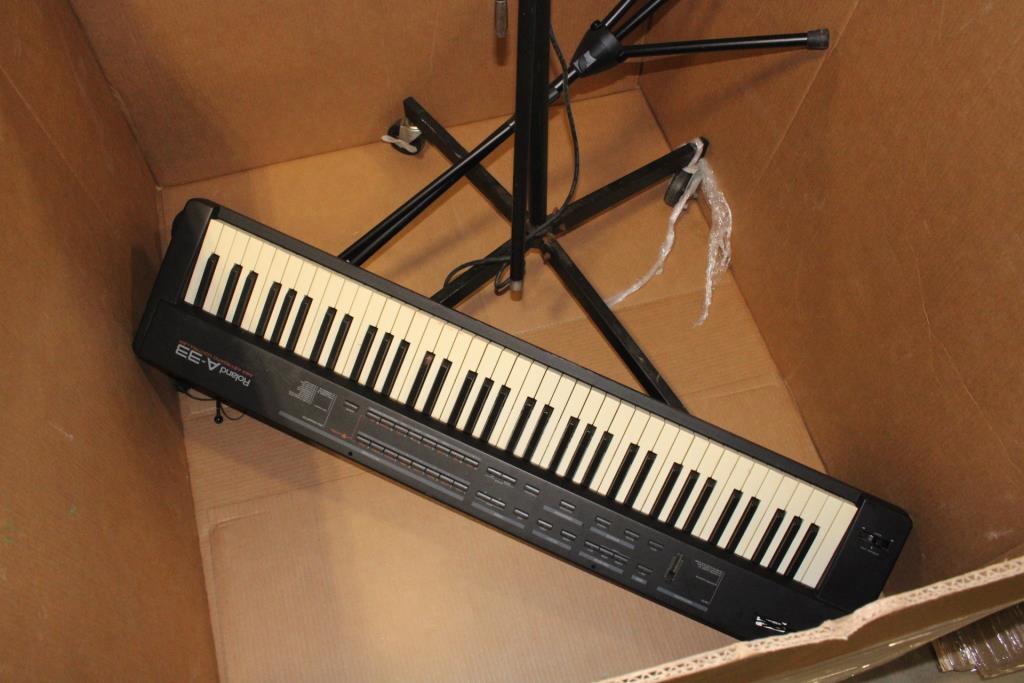 Pallet With Roland Keyboard, Stand & Microphone | Property Room