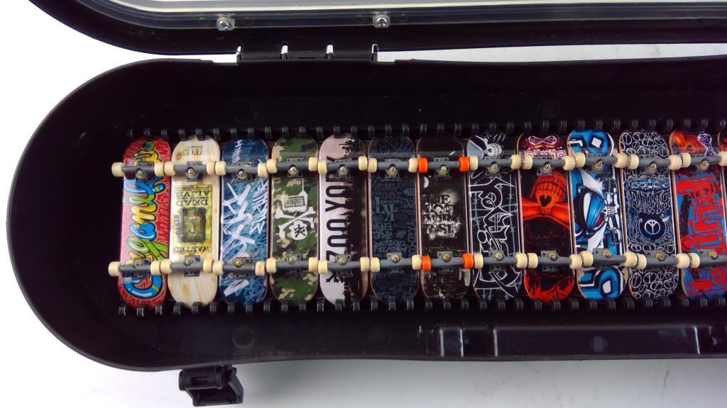 Plastic Carrying Case With Tech Decks, 18 Pieces | Property Room